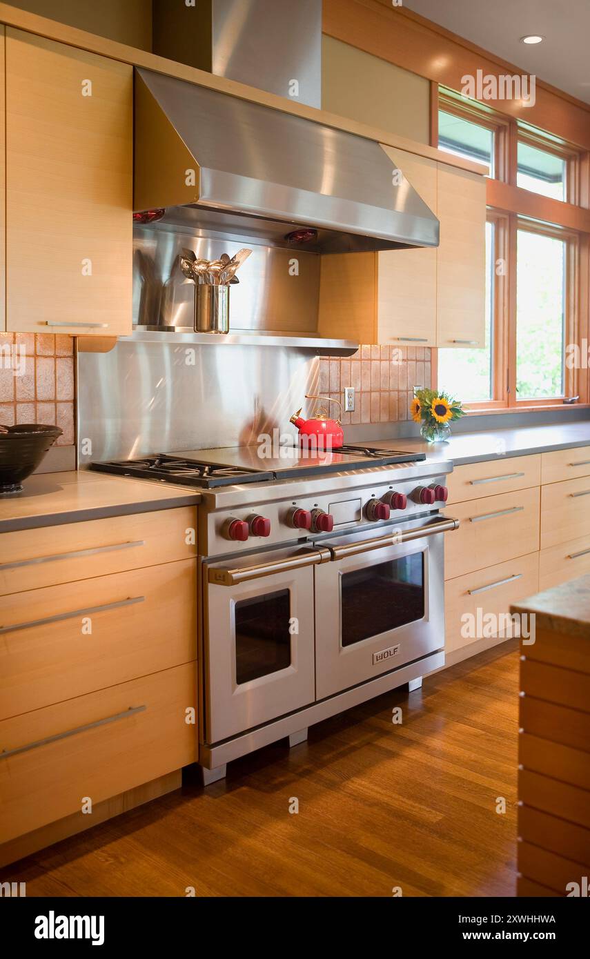 Kitchen cabinets and stainless steel Wolf stove Stock Photo - Alamy