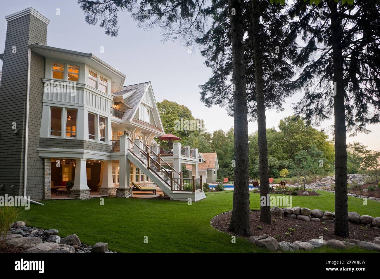 Side of house showing stone steps leading down to backyard with ...