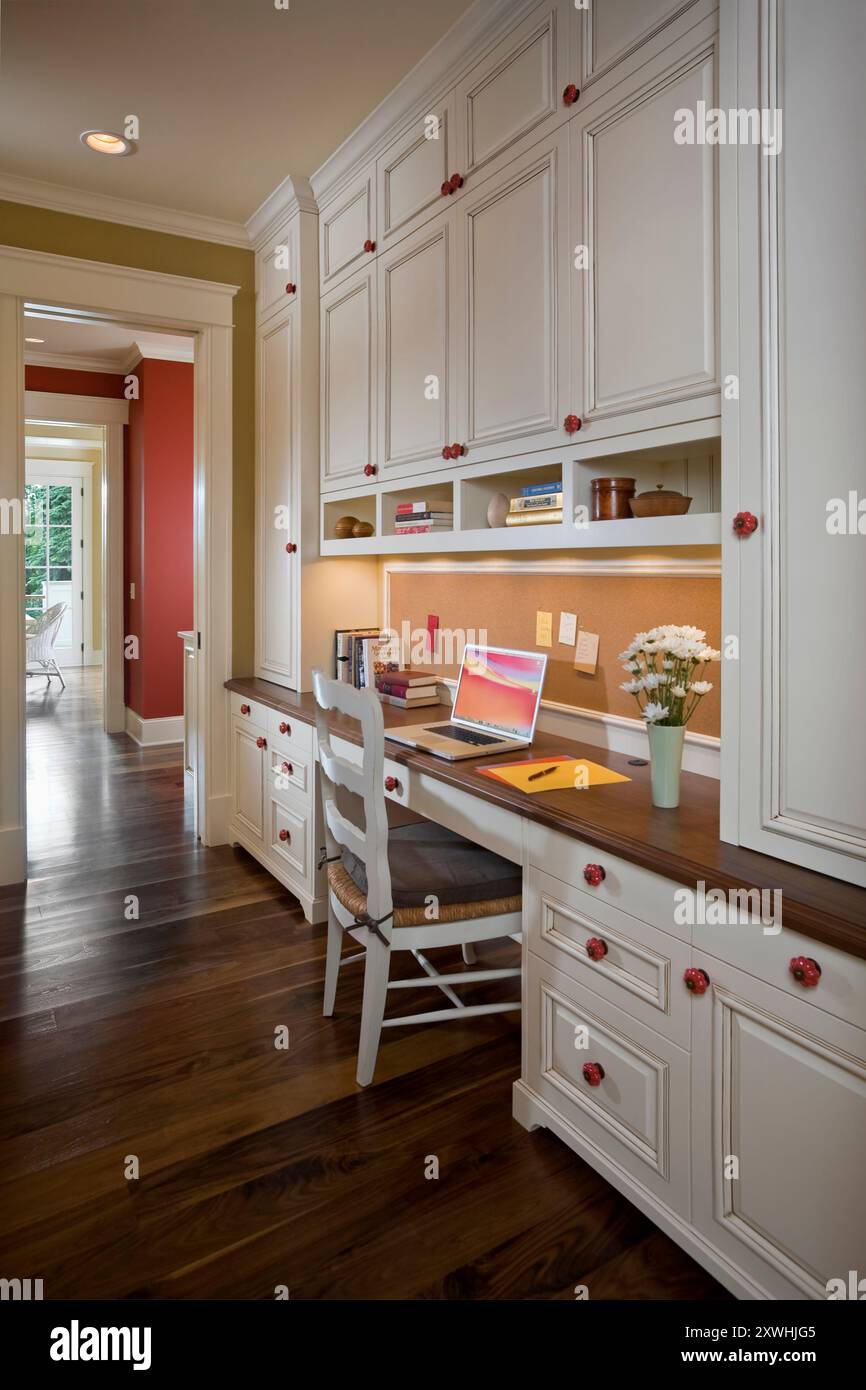 Colorful hallway leading into kitchen with built in home office Stock ...
