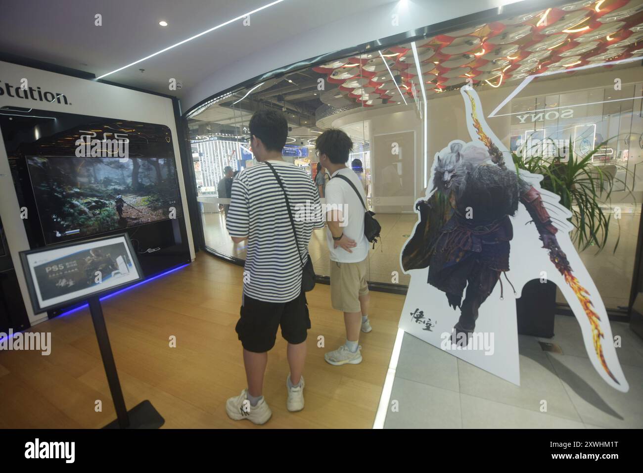 HANGZHOU, CHINA - AUGUST 20, 2024 - Game lovers play the first Chinese 3A game "Black Myth ...