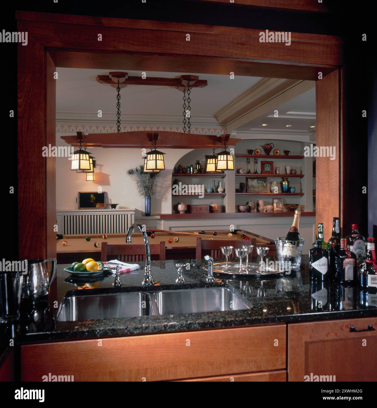 Bar with pool table in background Stock Photo - Alamy