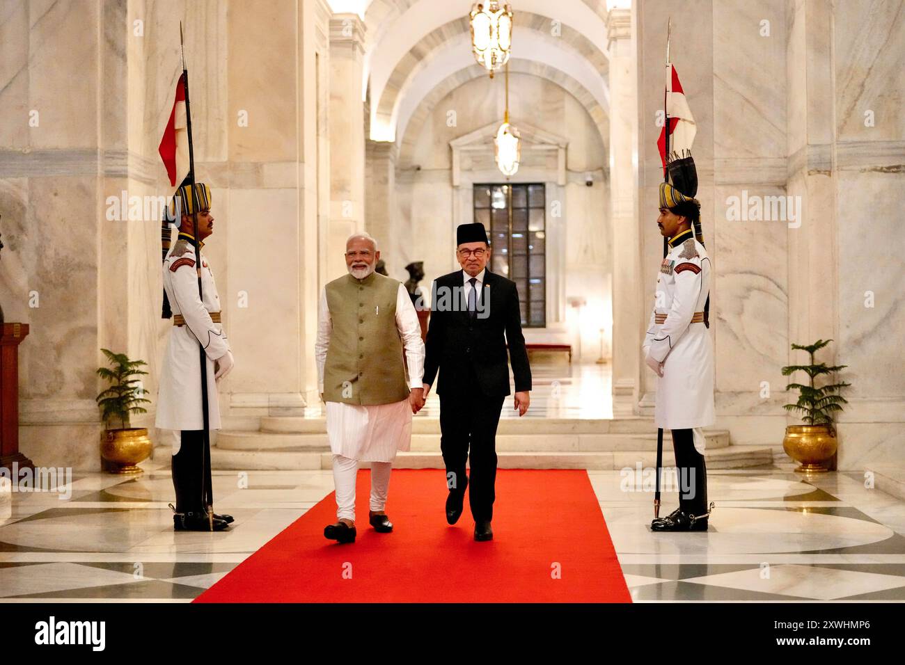 Indian Prime Minister Narendra Modi, left, with his Malaysian ...