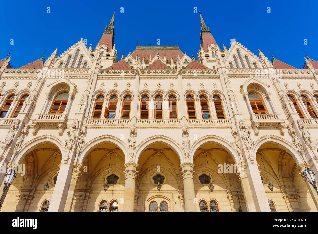 Facade of the Hungarian Parliament Building highlighted against a clear ...