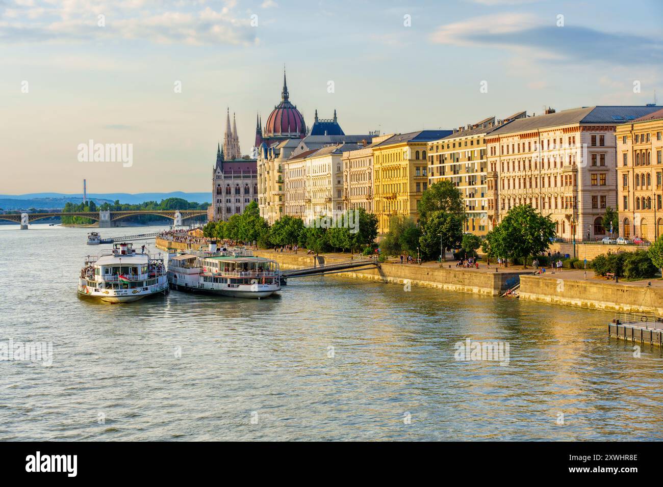 Budapest, Hungary - July 7, 2024: Tour boats docked along Danube River ...