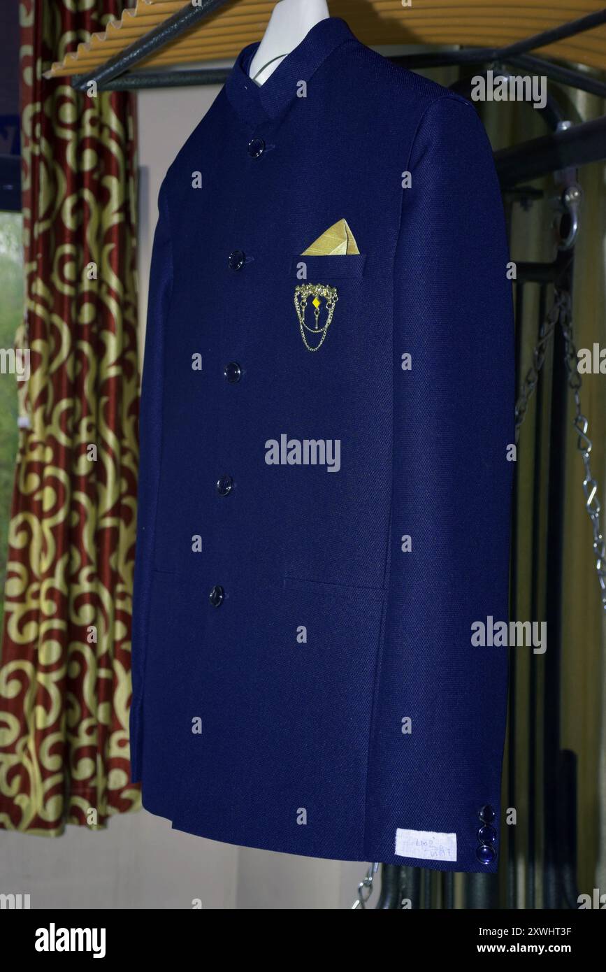 Hanging groom suit hi-res stock photography and images - Alamy