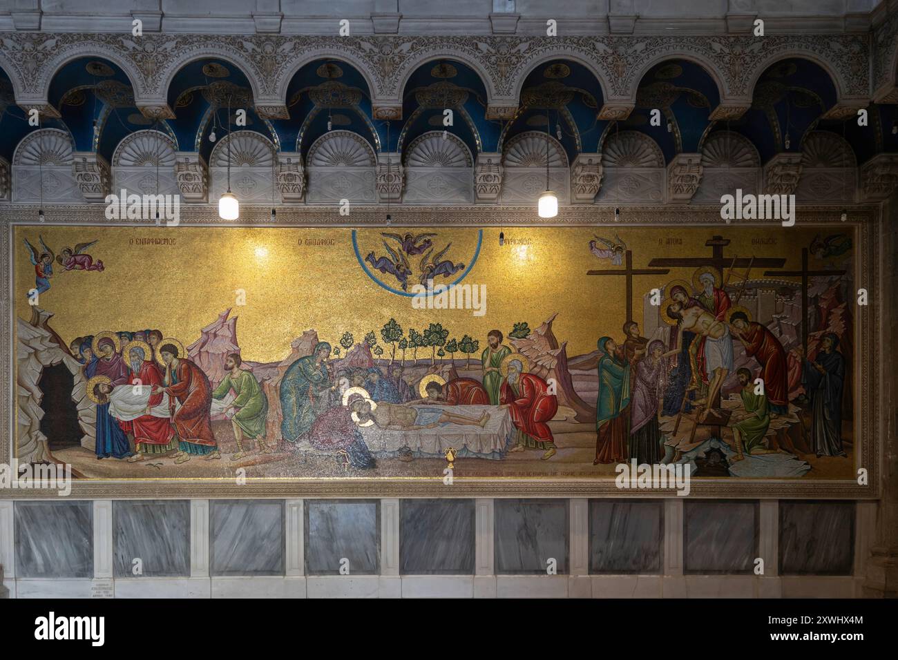 A wall mosaic painting depicting Jesus Christ's body being prepared ...