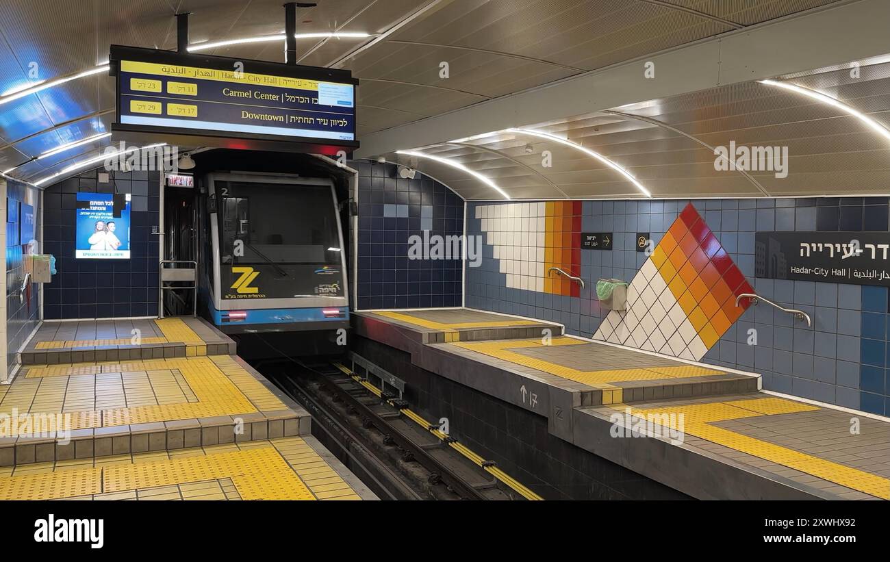 A train, which is a part of the Carmelit underground funicular railway ...