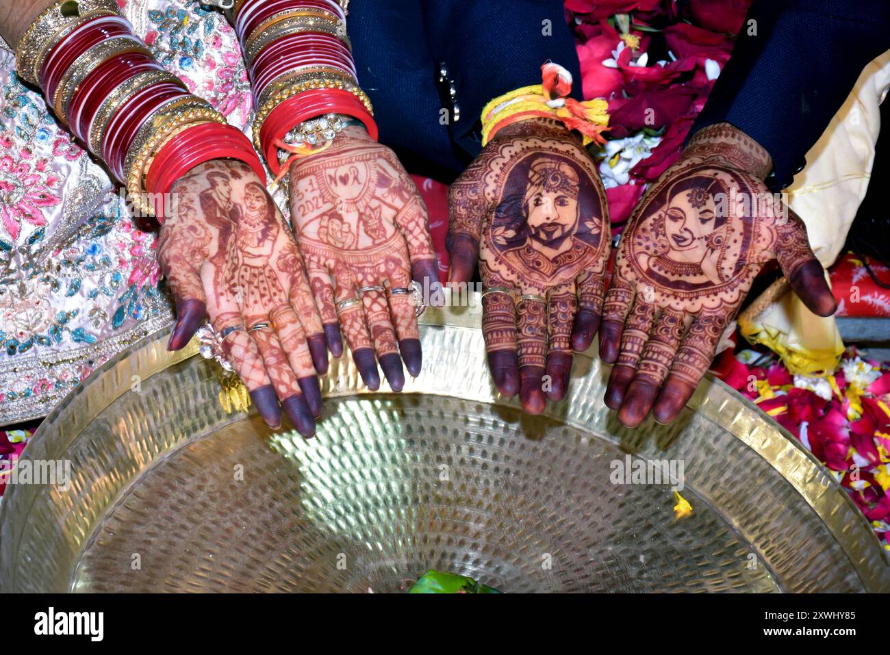The groom and the bride's hand during a Hindu wedding ceremony ...