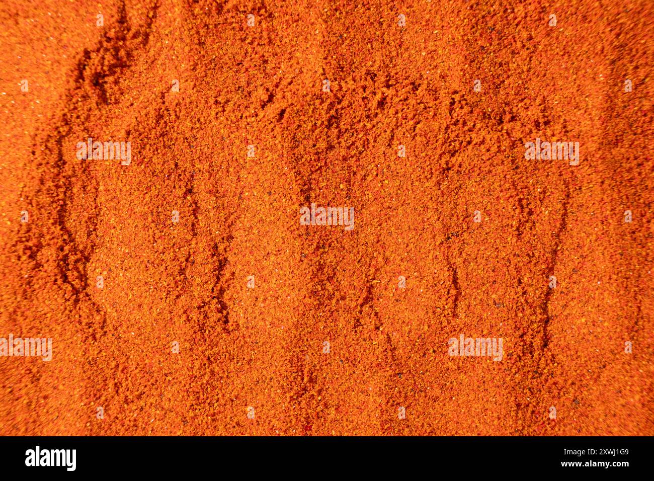 Ground paprika, red terracotta spice background, art in cooking Stock ...