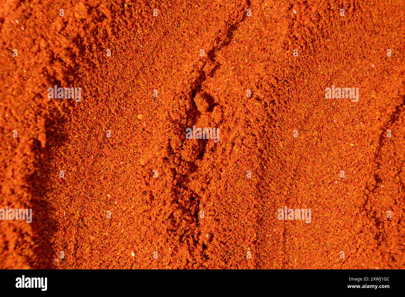 Ground paprika, red terracotta spice background, art in cooking Stock ...