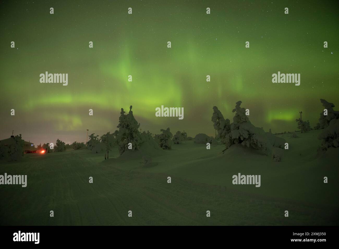 Northern lights over Levi Mountain and ski resort (Kittilä, Lapland ...