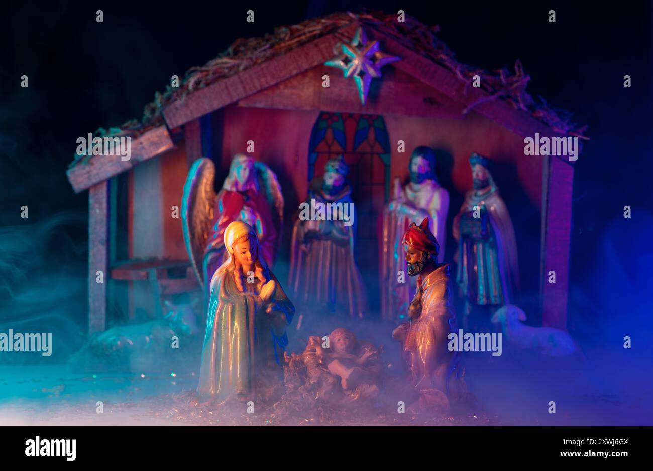 Christmas decorative creche with Holy family. Christmas creche with ...