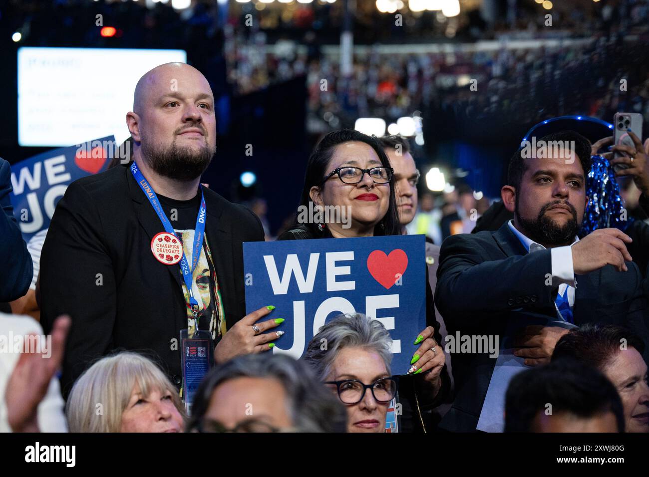 The crowd holds up signs that say “We Love Joe” as United States ...