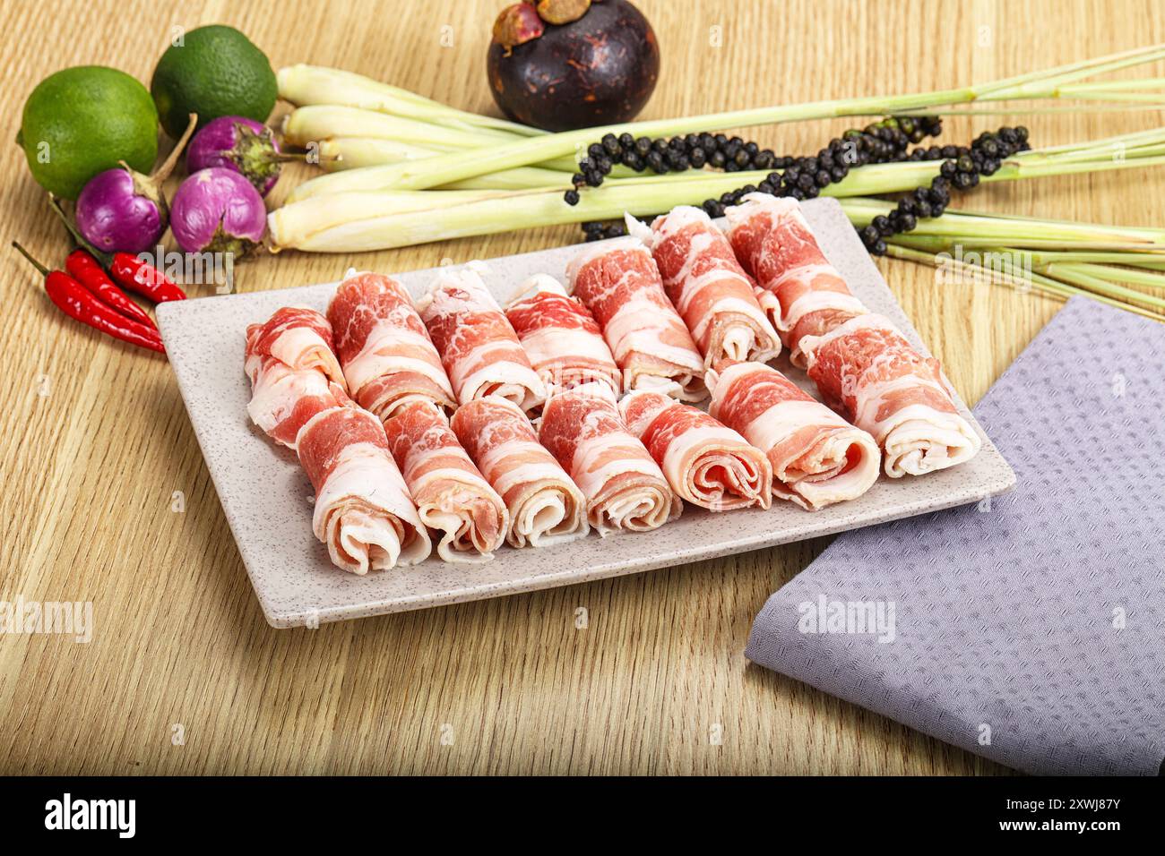 Raw beef bacon roll for grill Stock Photo - Alamy