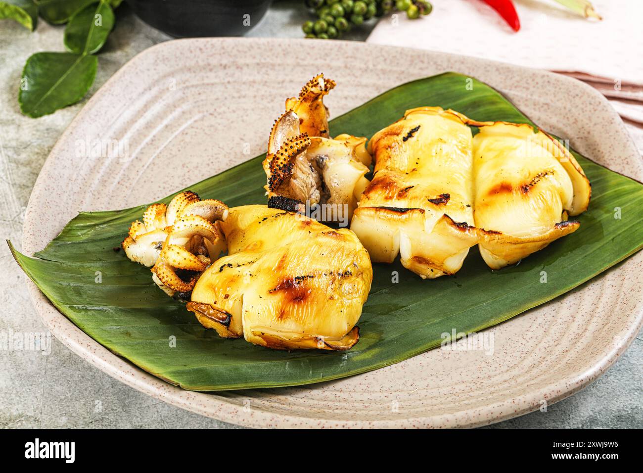 Delicous Grilled cuttlefish with sauce asian style Stock Photo - Alamy