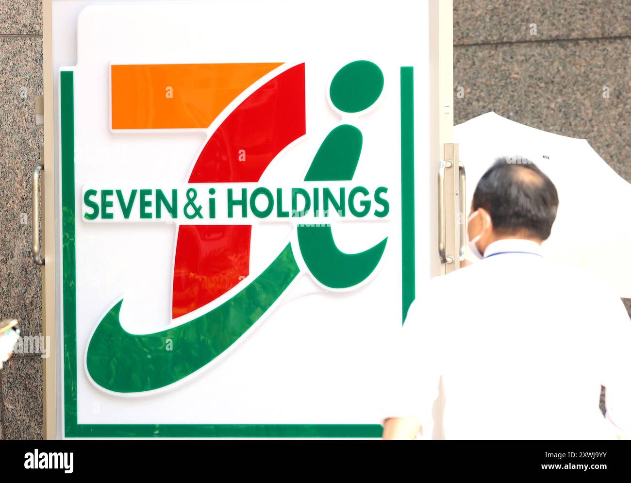 Tokyo, Japan. 20th Aug, 2024. A Seven & i Holdings logo is displayed at ...