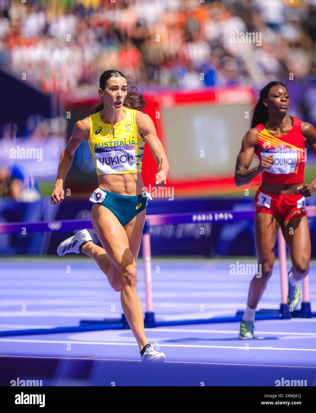 Alanah Yukich participating in the 400 meters hurdles at the Paris 2024 ...