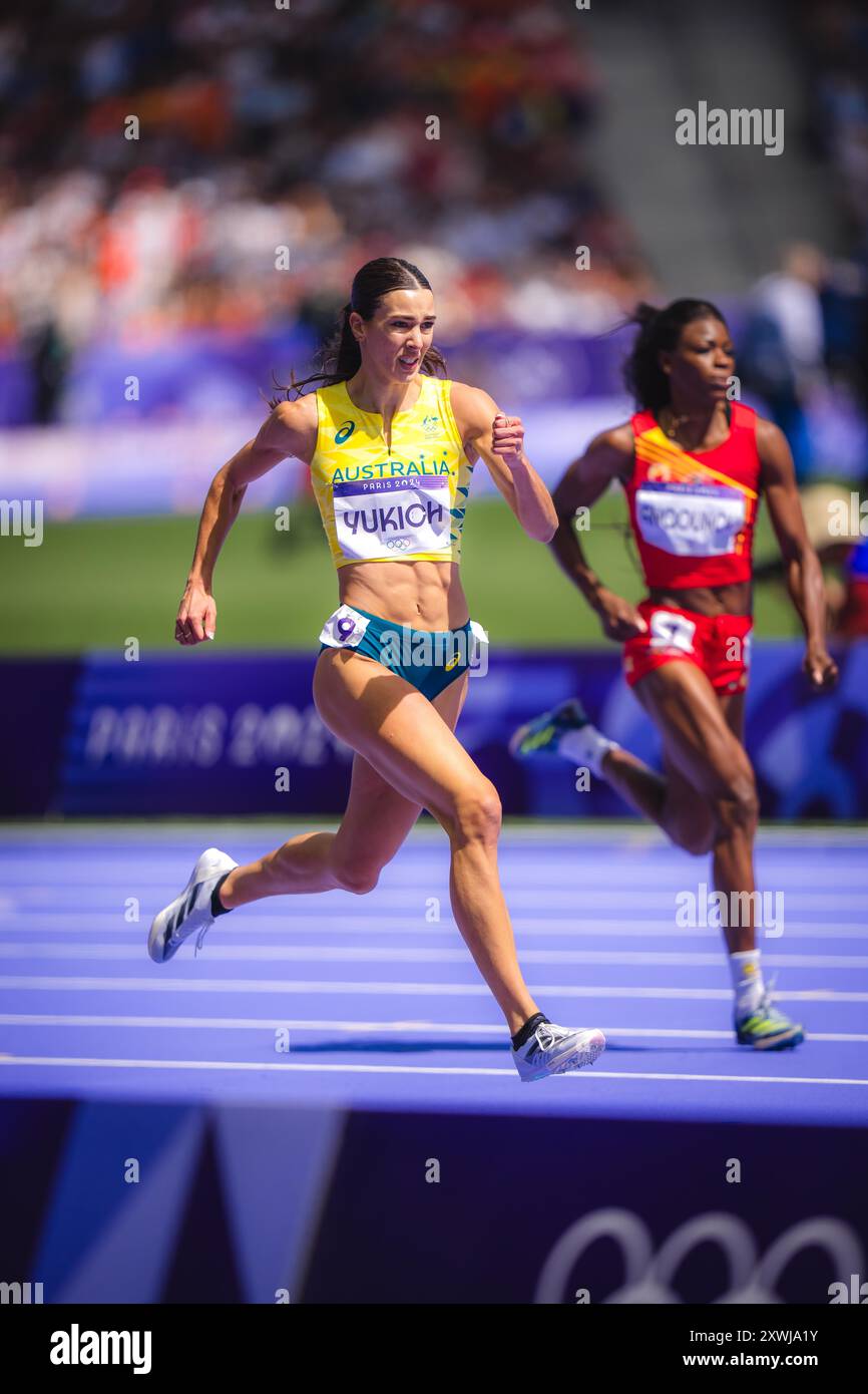 Alanah Yukich participating in the 400 meters hurdles at the Paris 2024 ...