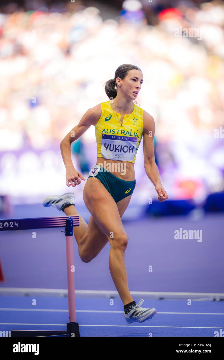 Alanah Yukich participating in the 400 meters hurdles at the Paris 2024 ...