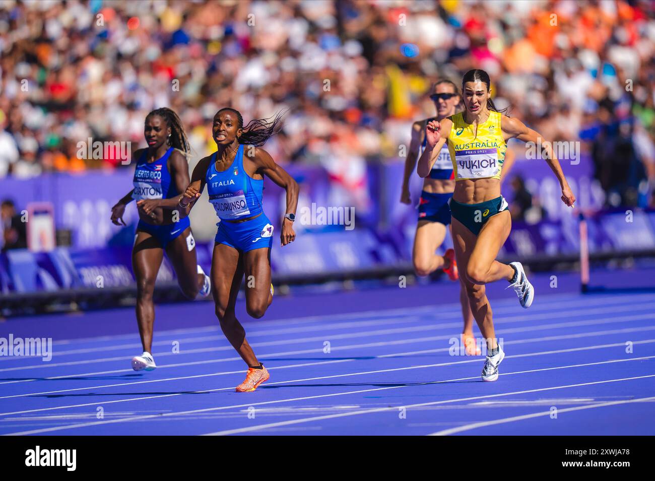 Alanah Yukich participating in the 400 meters hurdles at the Paris 2024 ...