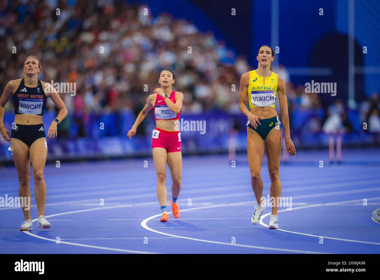 Alanah Yukich participating in the 400 meters hurdles at the Paris 2024 ...