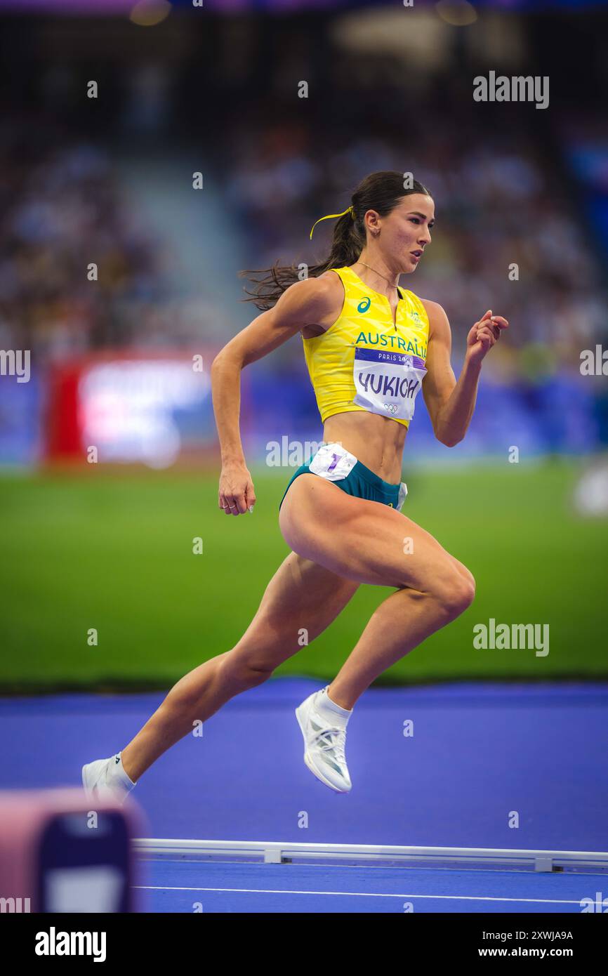 Alanah Yukich participating in the 400 meters hurdles at the Paris 2024 ...