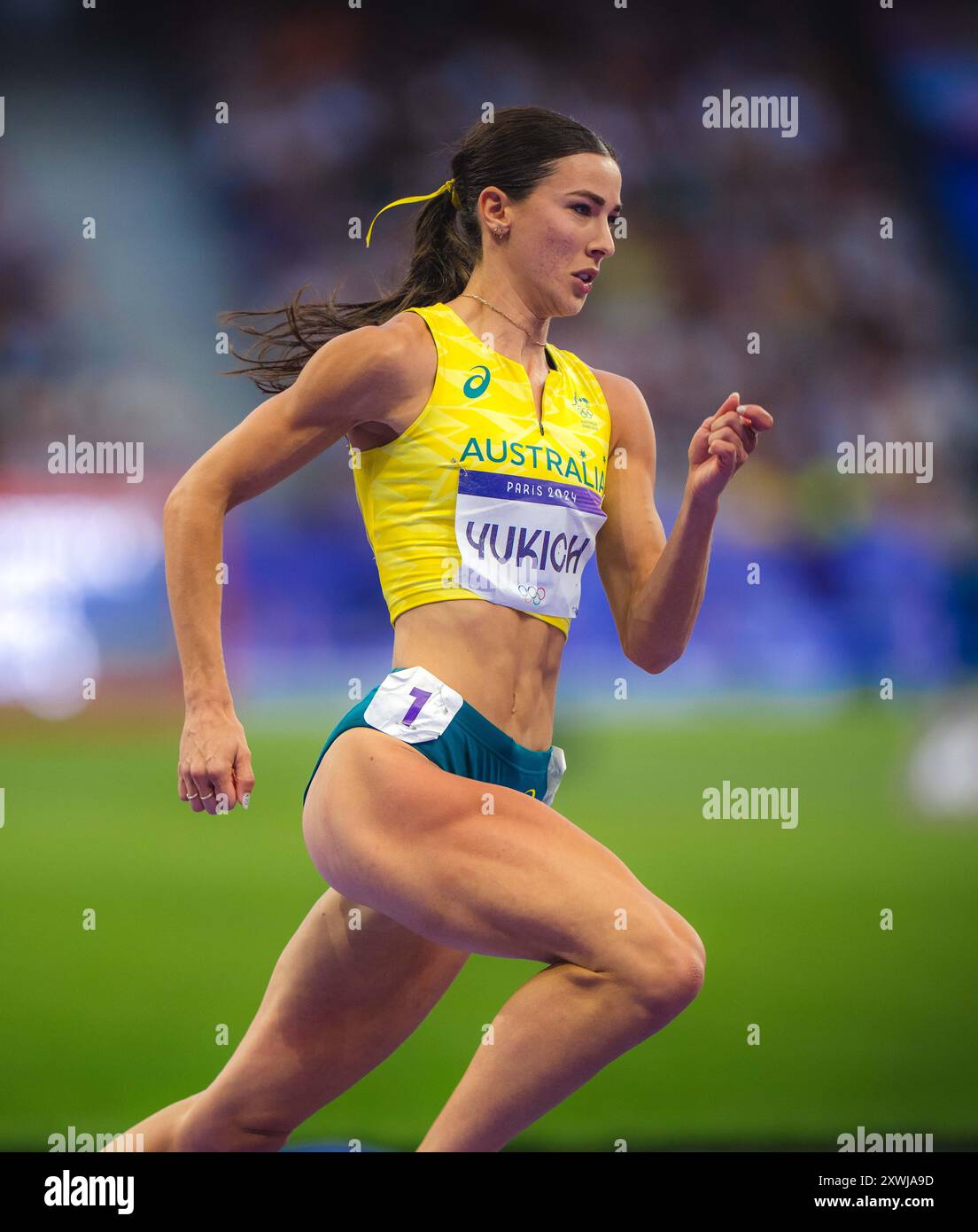Alanah Yukich participating in the 400 meters hurdles at the Paris 2024 ...