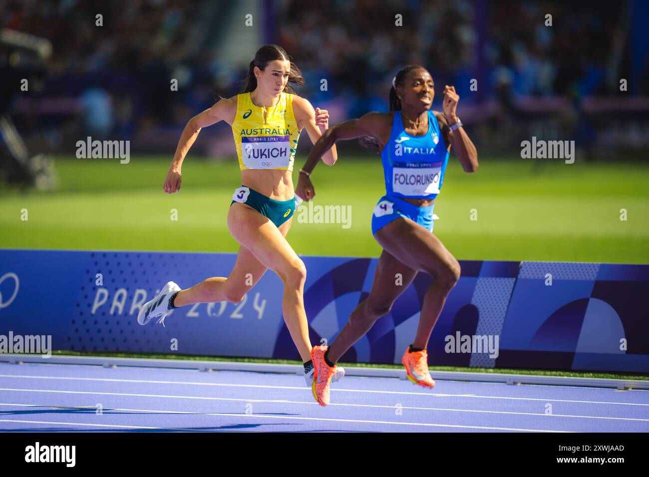 Alanah Yukich participating in the 400 meters hurdles at the Paris 2024 ...