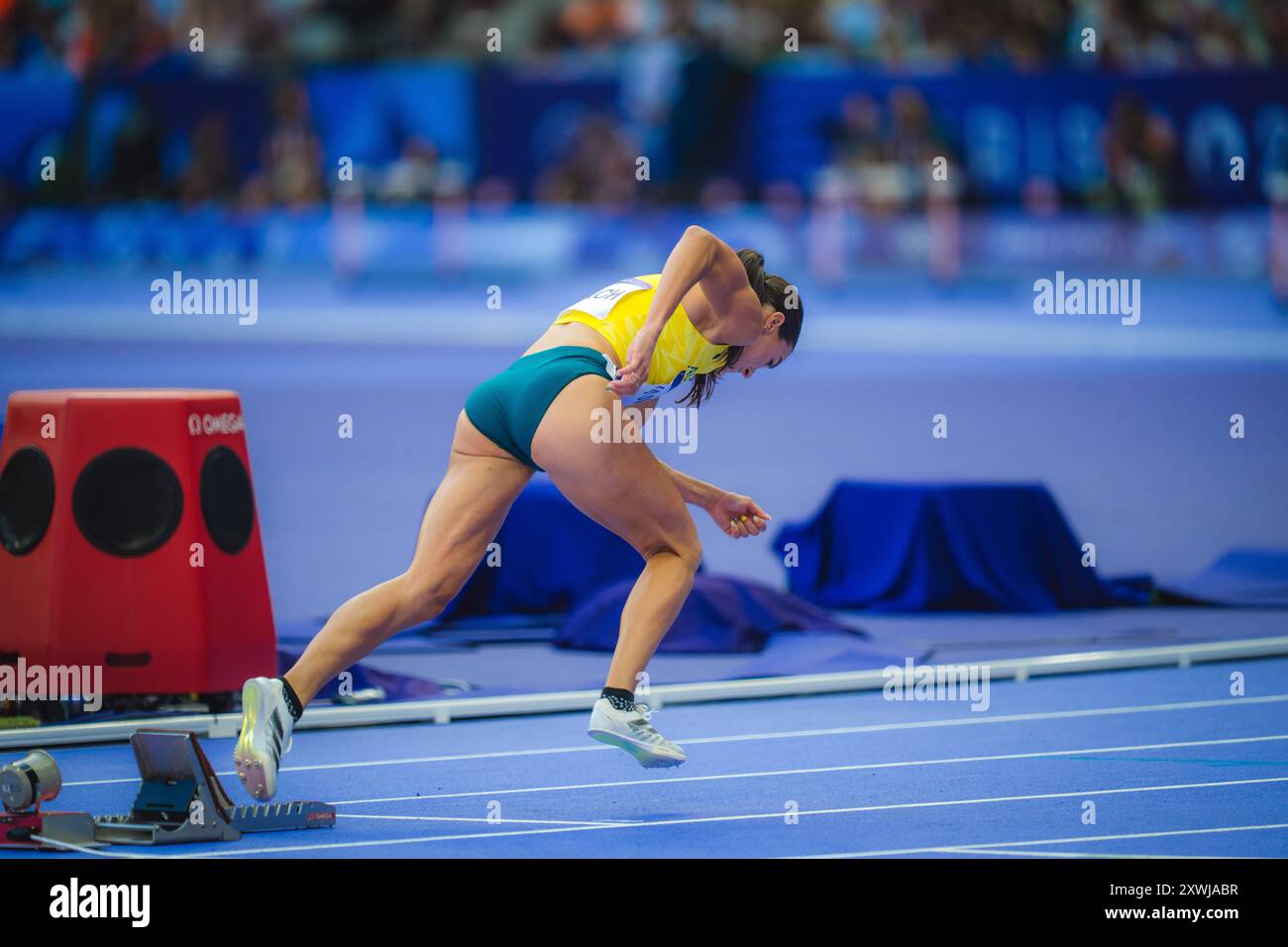 Alanah Yukich participating in the 400 meters hurdles at the Paris 2024 ...