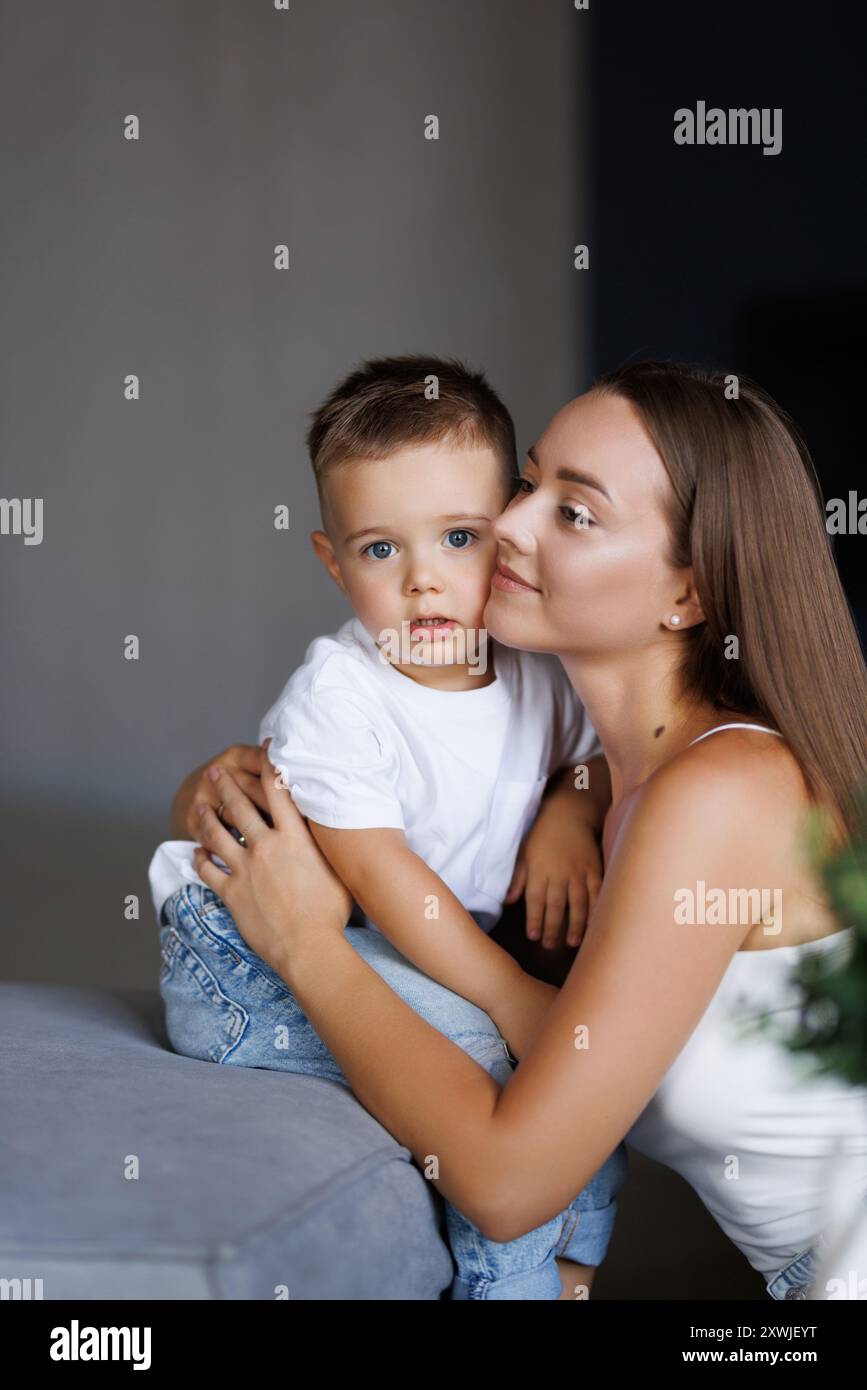 Woman two kid sit hi-res stock photography and images - Alamy