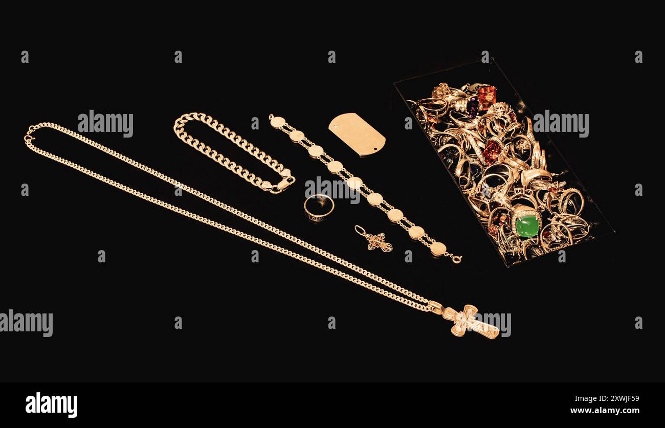 gold collection in the black Stock Photo - Alamy