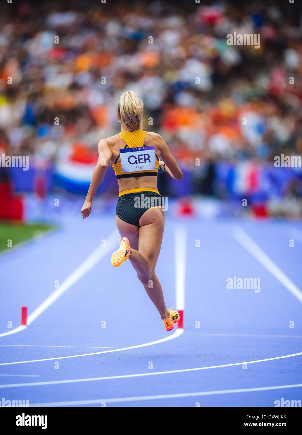 Alica Schmidt participating in the 4X400 meters relay at the Paris 2024 ...