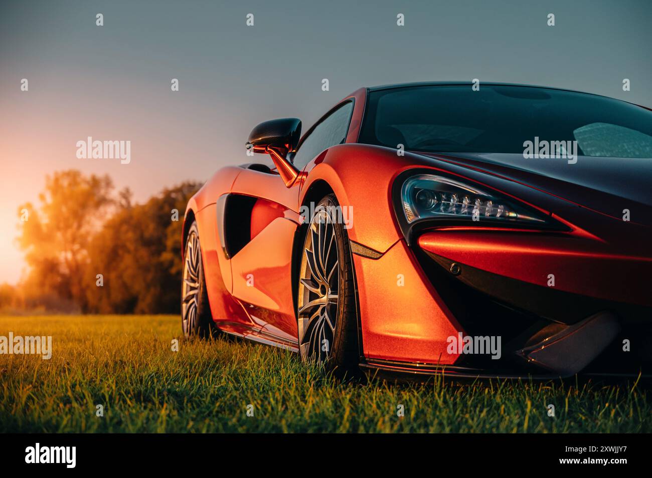 McLaren 570 GT - Volcano Orange Stock Photo - Alamy