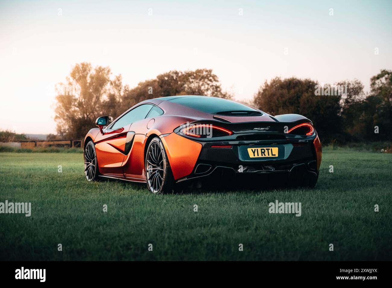 McLaren 570 GT - Volcano Orange Stock Photo - Alamy