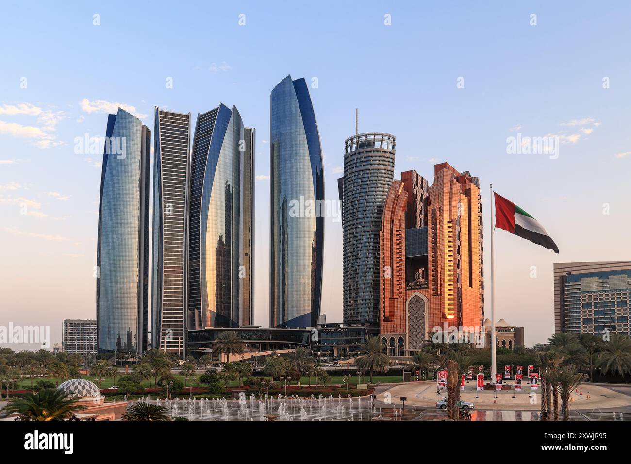 Abu Dhabi, UAE - February 27. 2023: Etihad Towers with UAE flag. Etihad ...