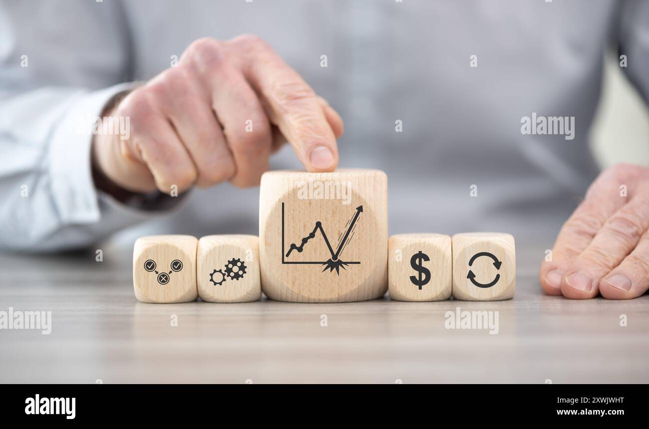 Wooden blocks with symbol of rebound concept Stock Photo - Alamy