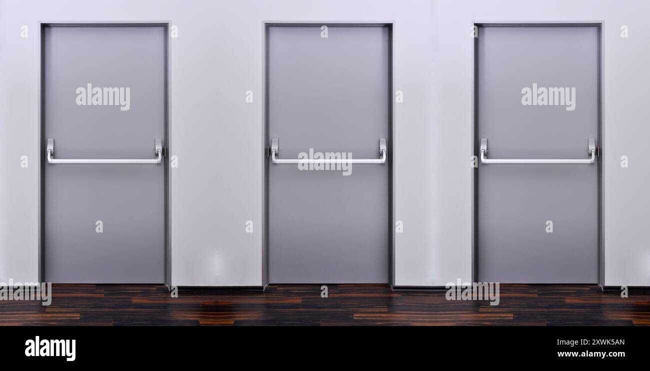 Emergency exit three grey door. Closed up latch and orange door handle ...