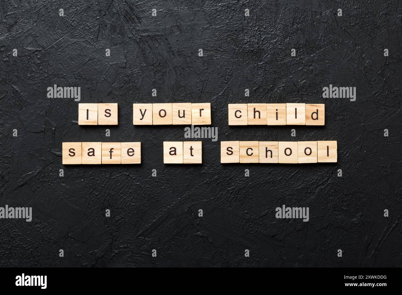 Is your child safe at school word written on wood block. Is your child ...