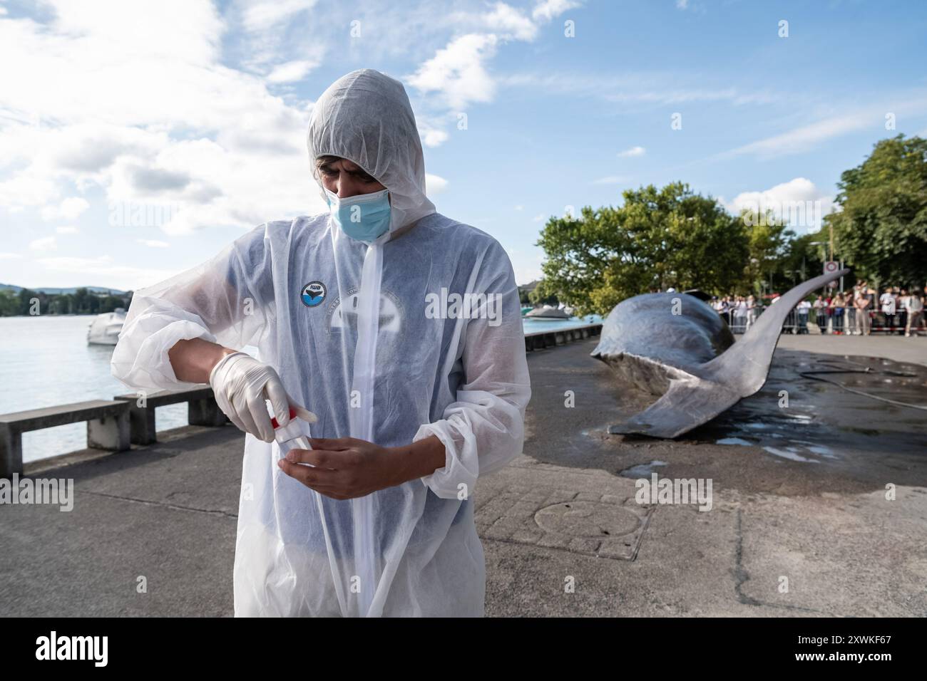 An actor in a forensic dress seen performing in front of a stranded ...