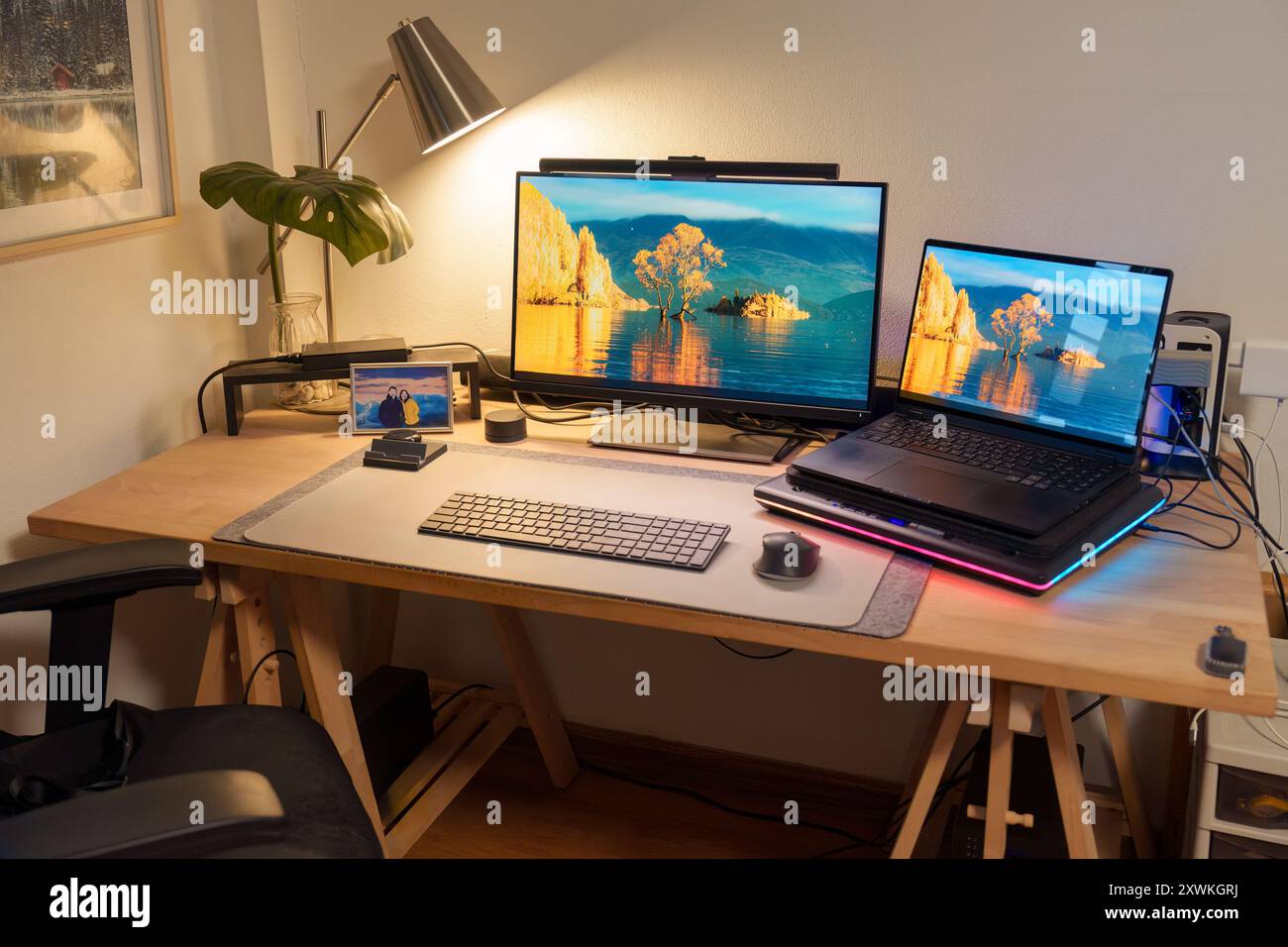 Interior workplace of photographer with laptop, monitor, computer ...