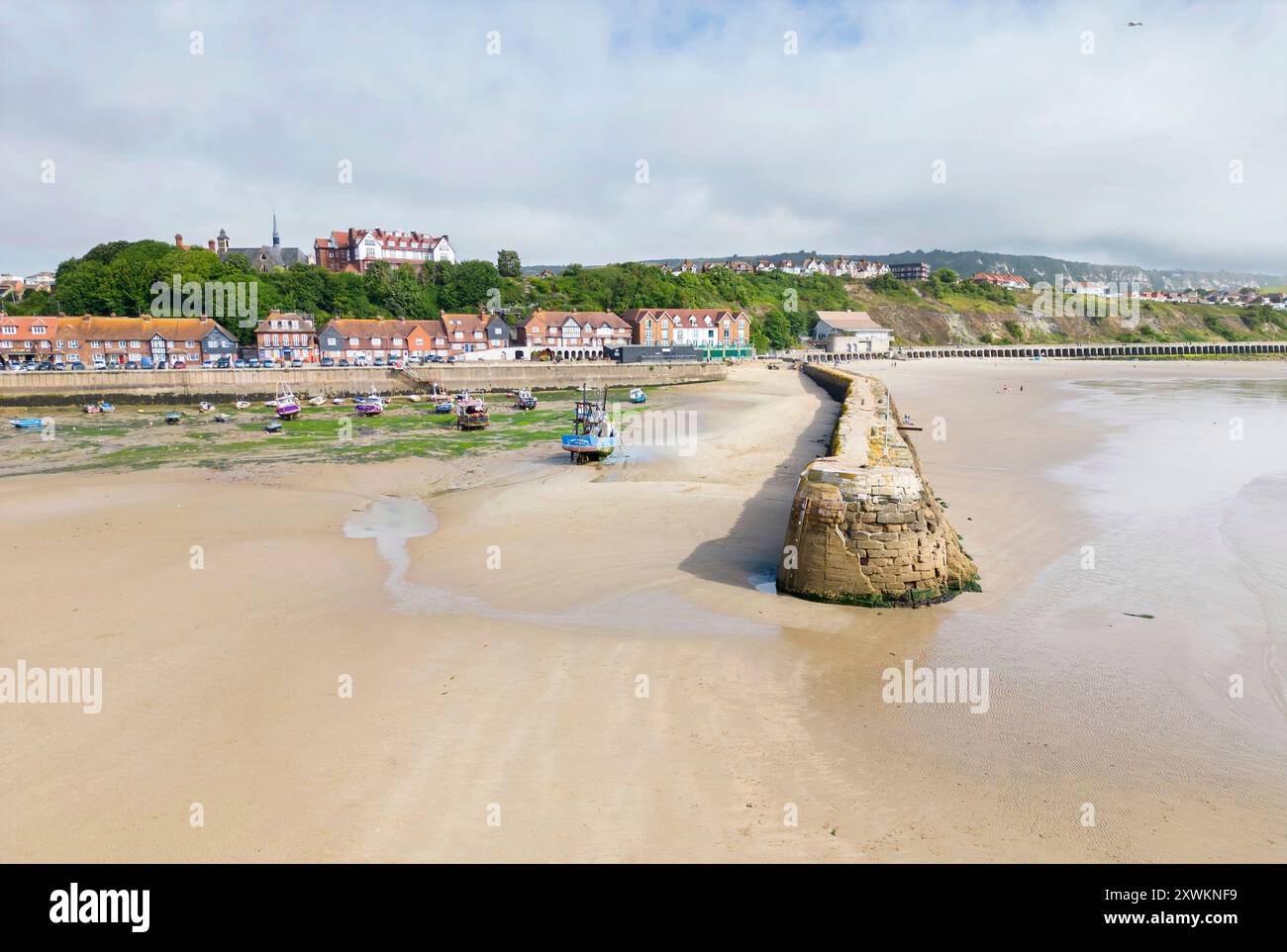 aerial view of low tide at folkestone harbour and beach on the kent ...