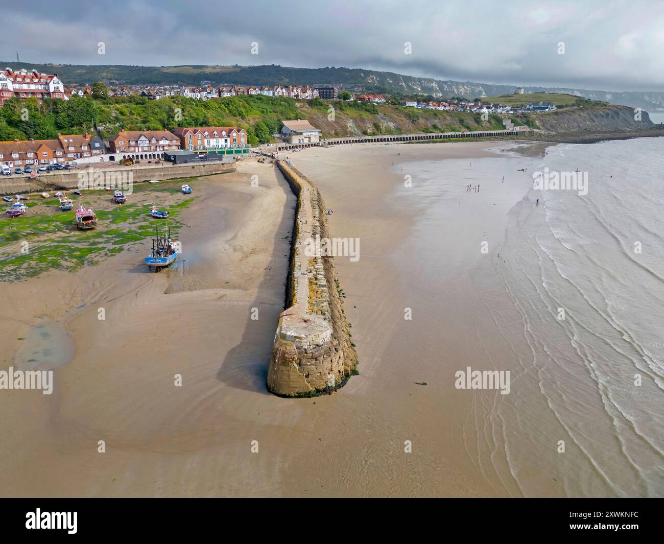 aerial view of low tide at folkestone harbour and beach on the kent ...