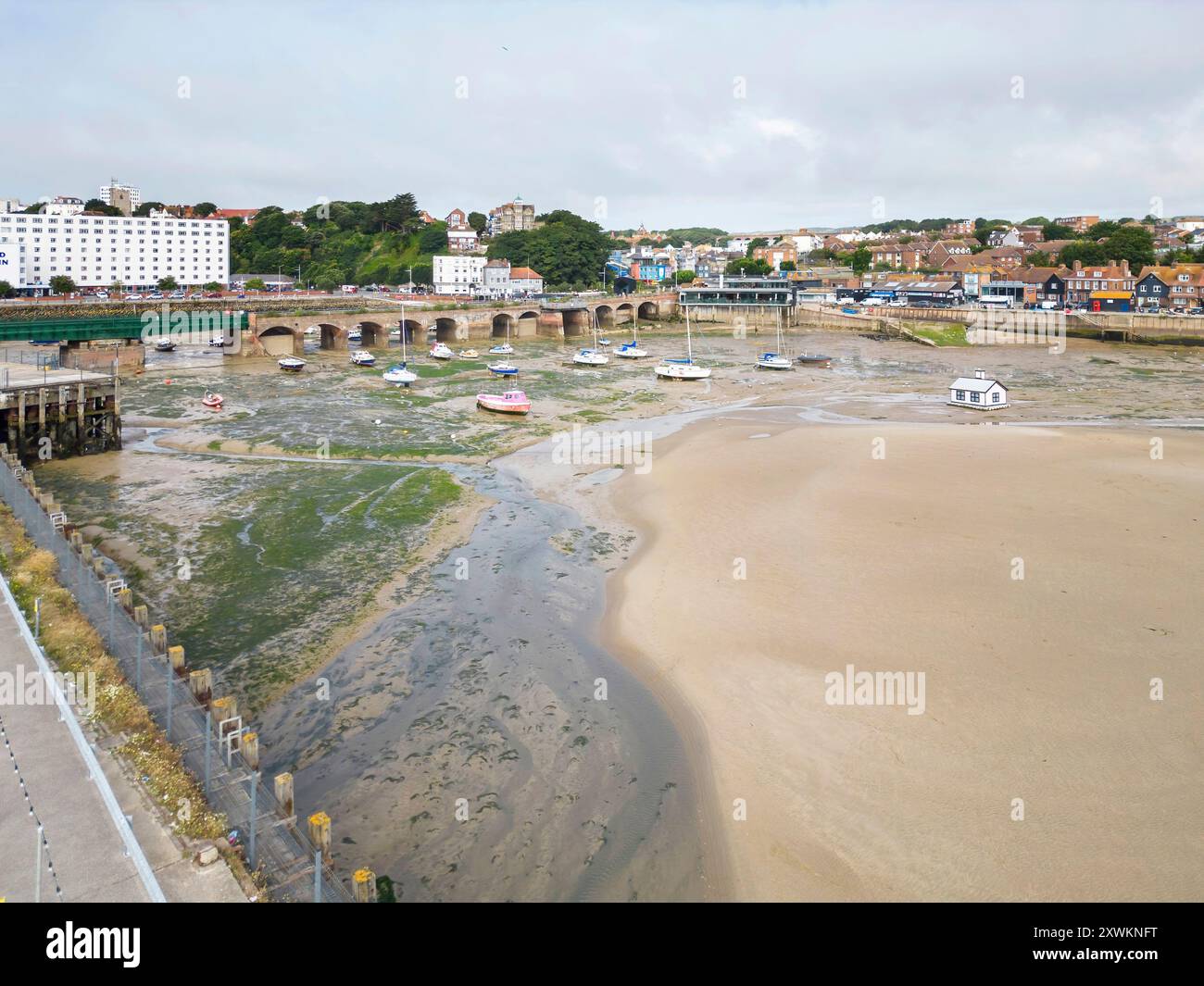 aerial view of low tide at folkestone harbour and beach on the kent ...