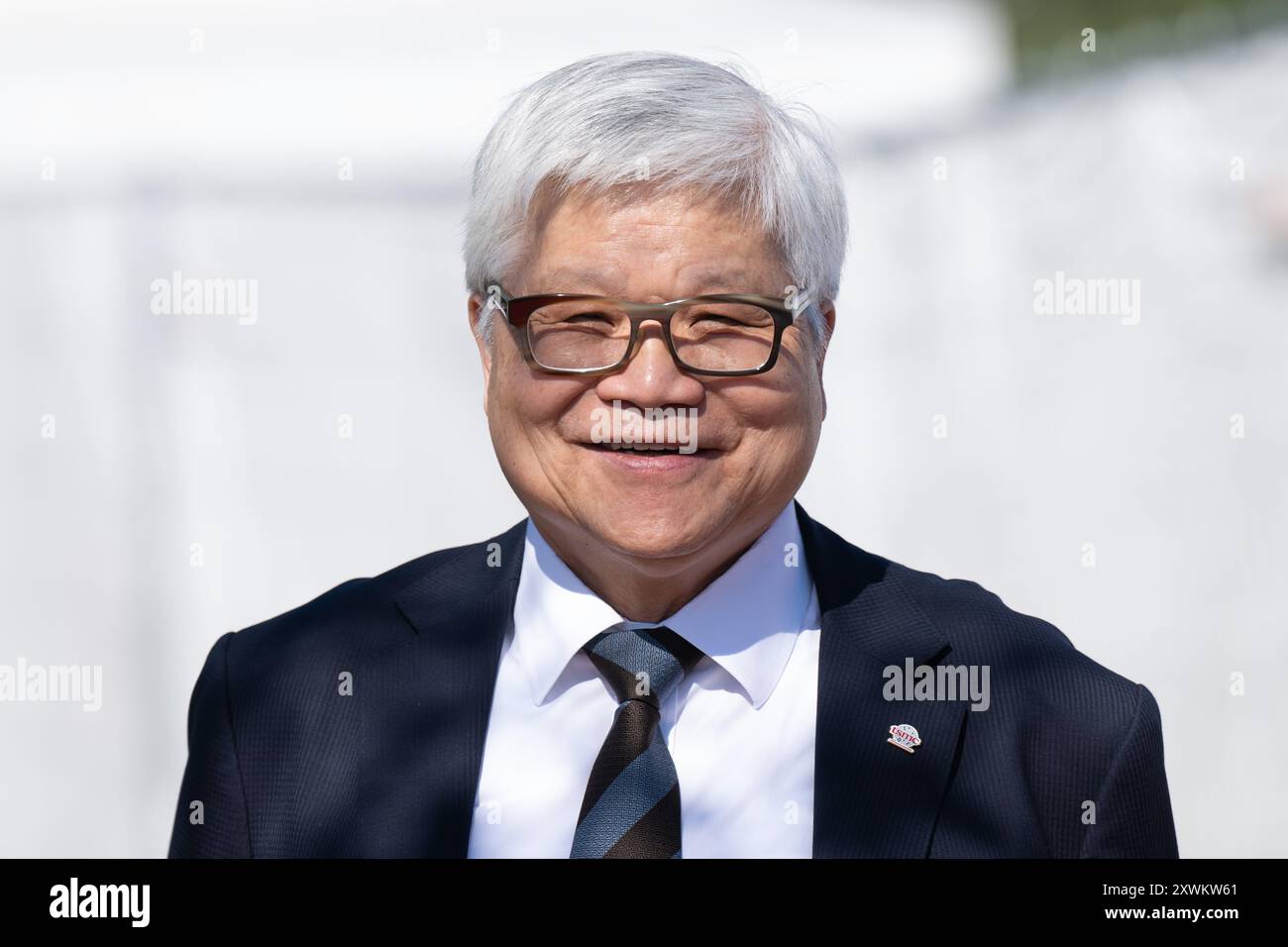 20 August 2024, Saxony, Dresden: C.C. Wei, TSMC Group CEO, stands on the future site of a chip ...