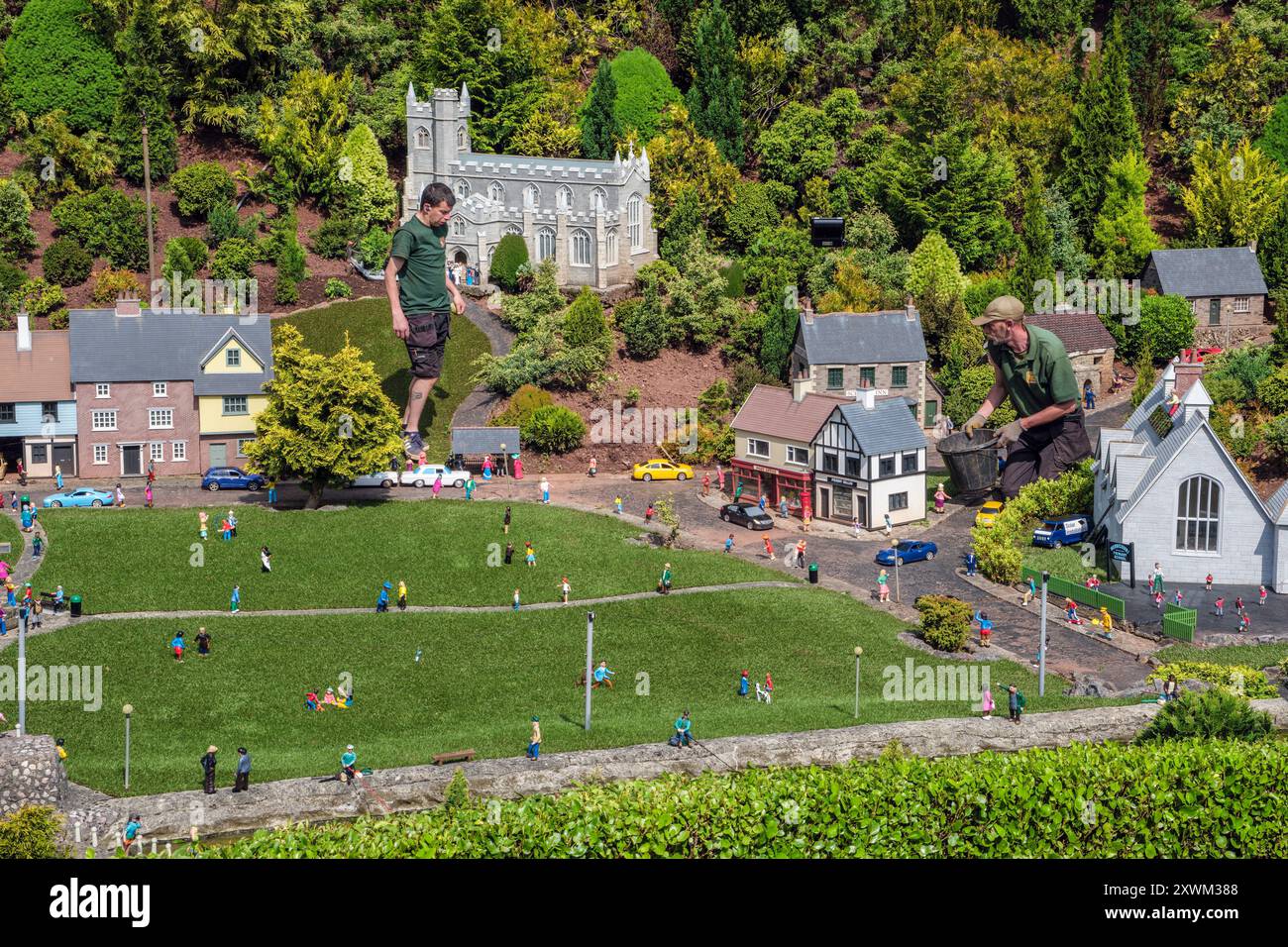 Gardeners working at Babbacombe Model Village, Torquay, Devon Stock ...