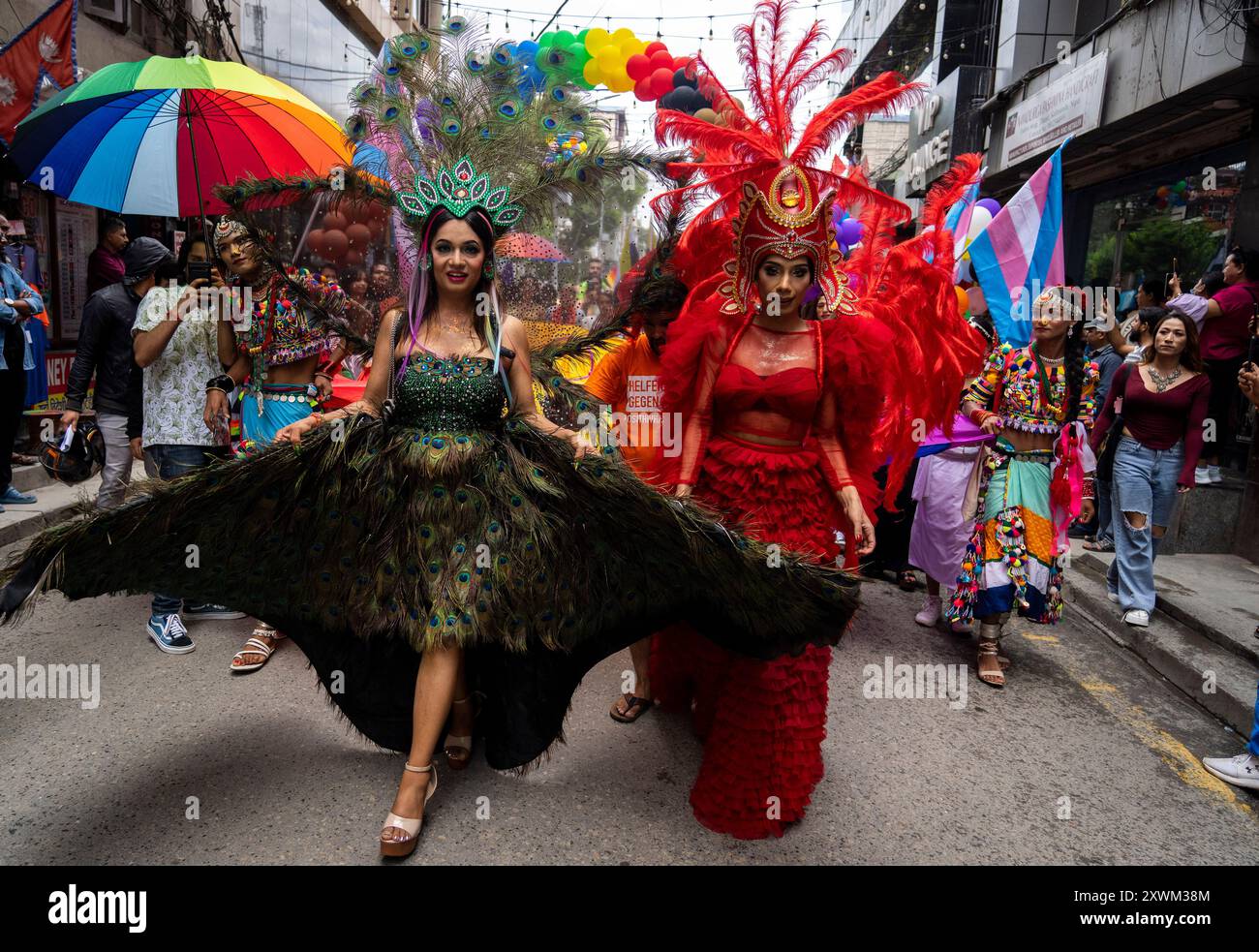 LGBTQ+ people and their supporters rally during the annual pride parade ...