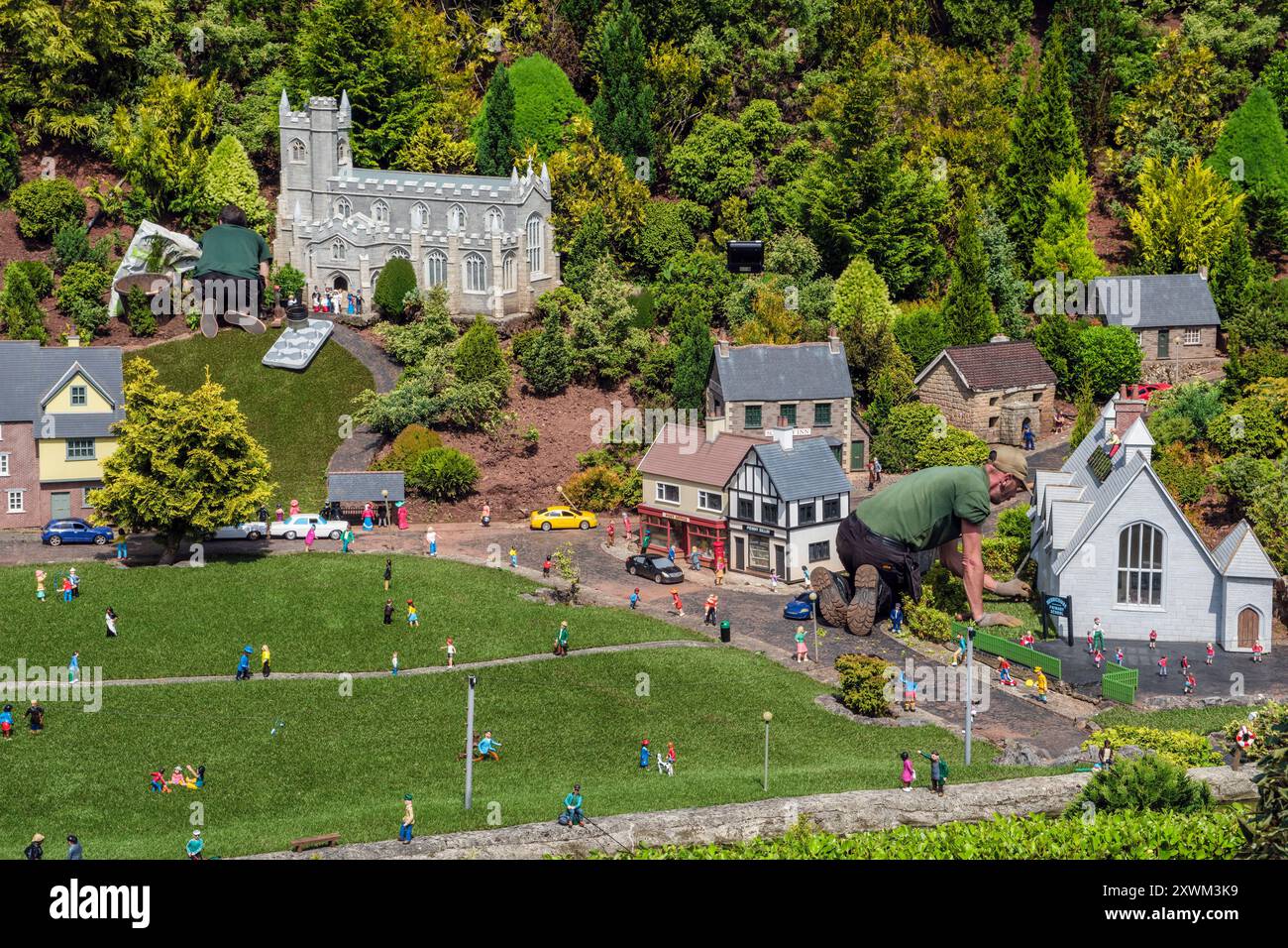 Gardeners working at Babbacombe Model Village, Torquay, Devon Stock ...