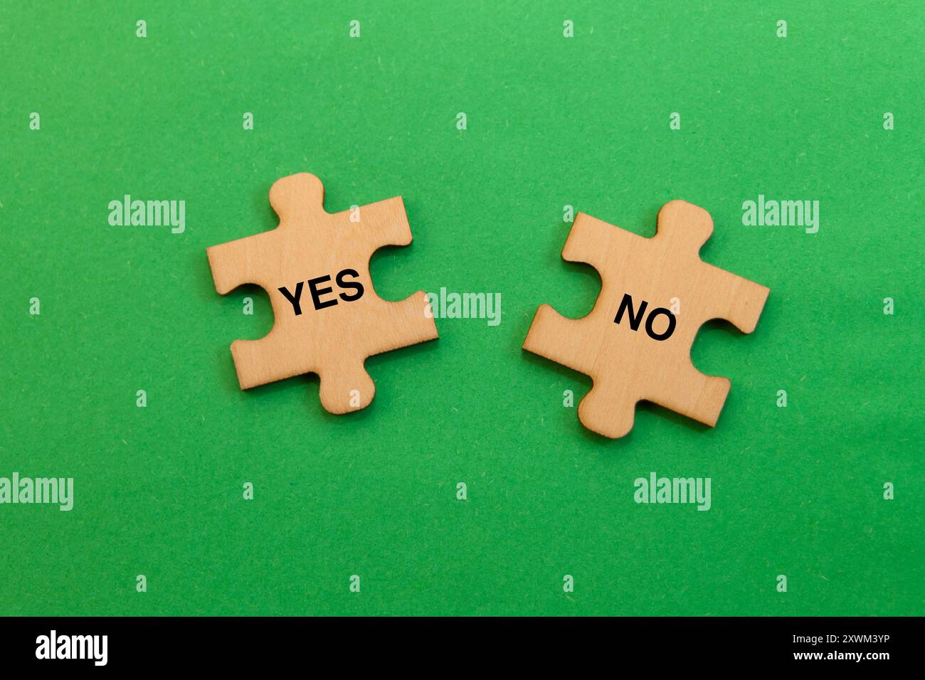 Two puzzle pieces present a clear decision point - will it be yes or no ...