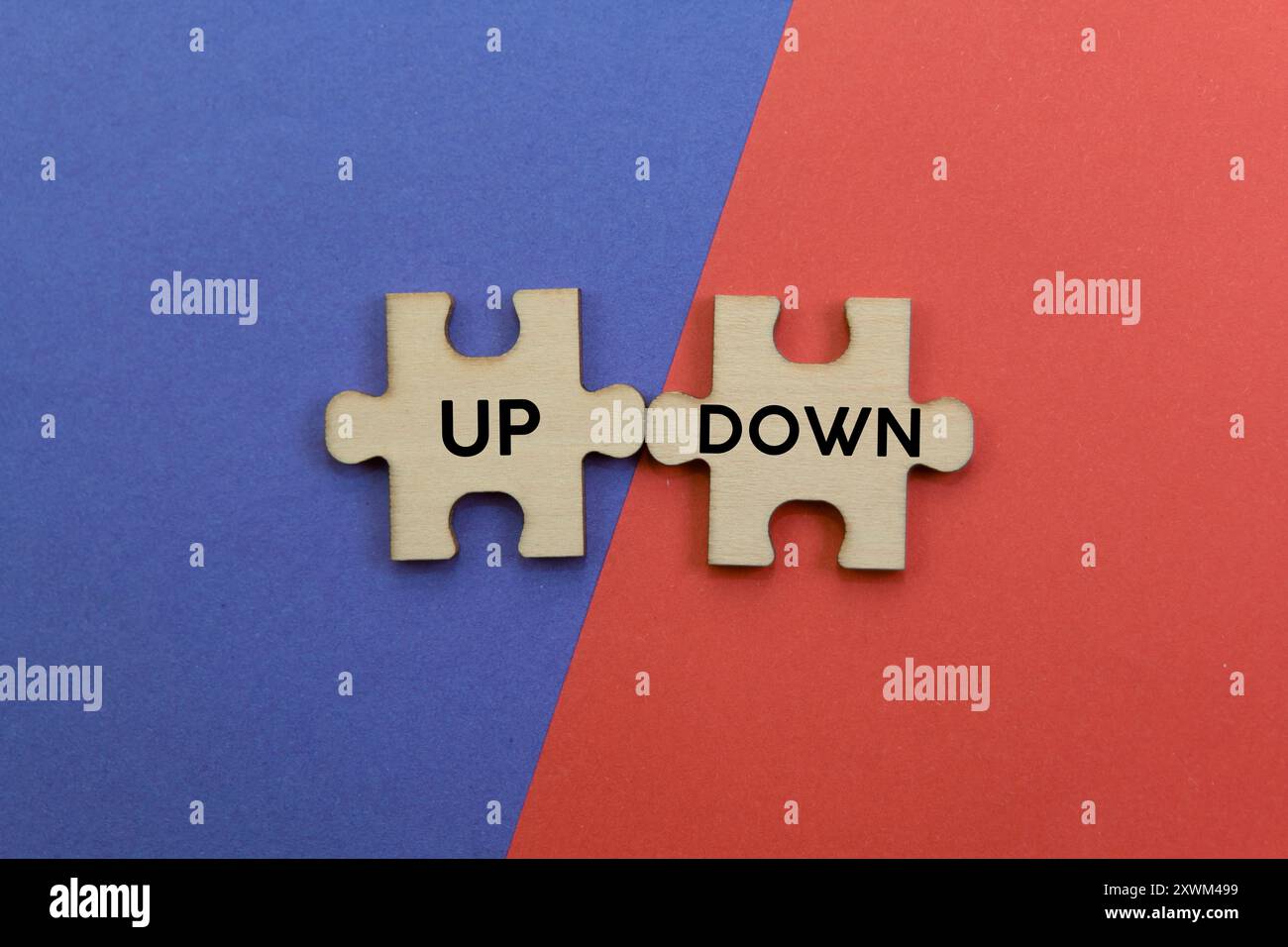 Two puzzle pieces with "Up" and "Down" illustrate a choice, decision ...