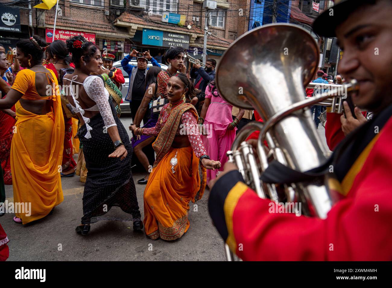 LGBTQ+ people and their supporters dance and rally during the annual ...